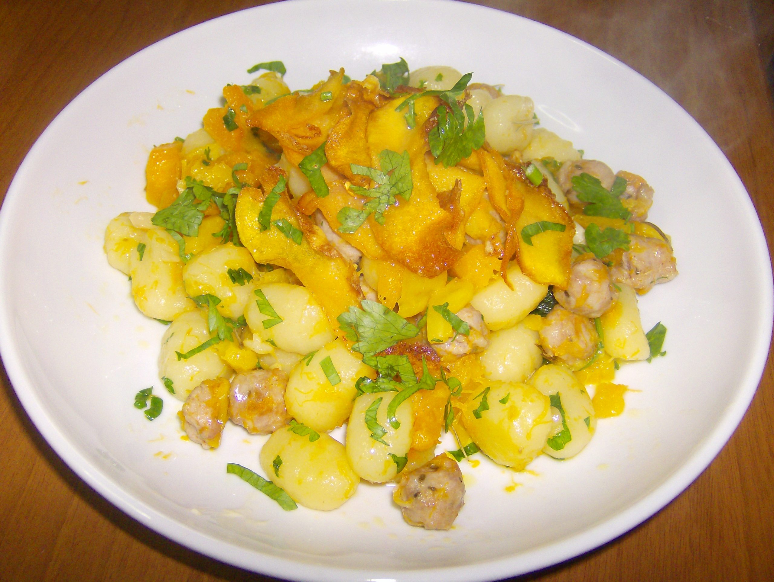 Gnocchi con zucca e salsiccia - Ricette